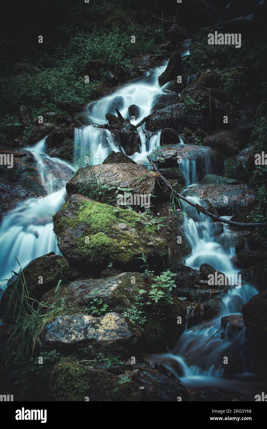 Waterfall in south tirol - dark mood Stock Photo - Alamy