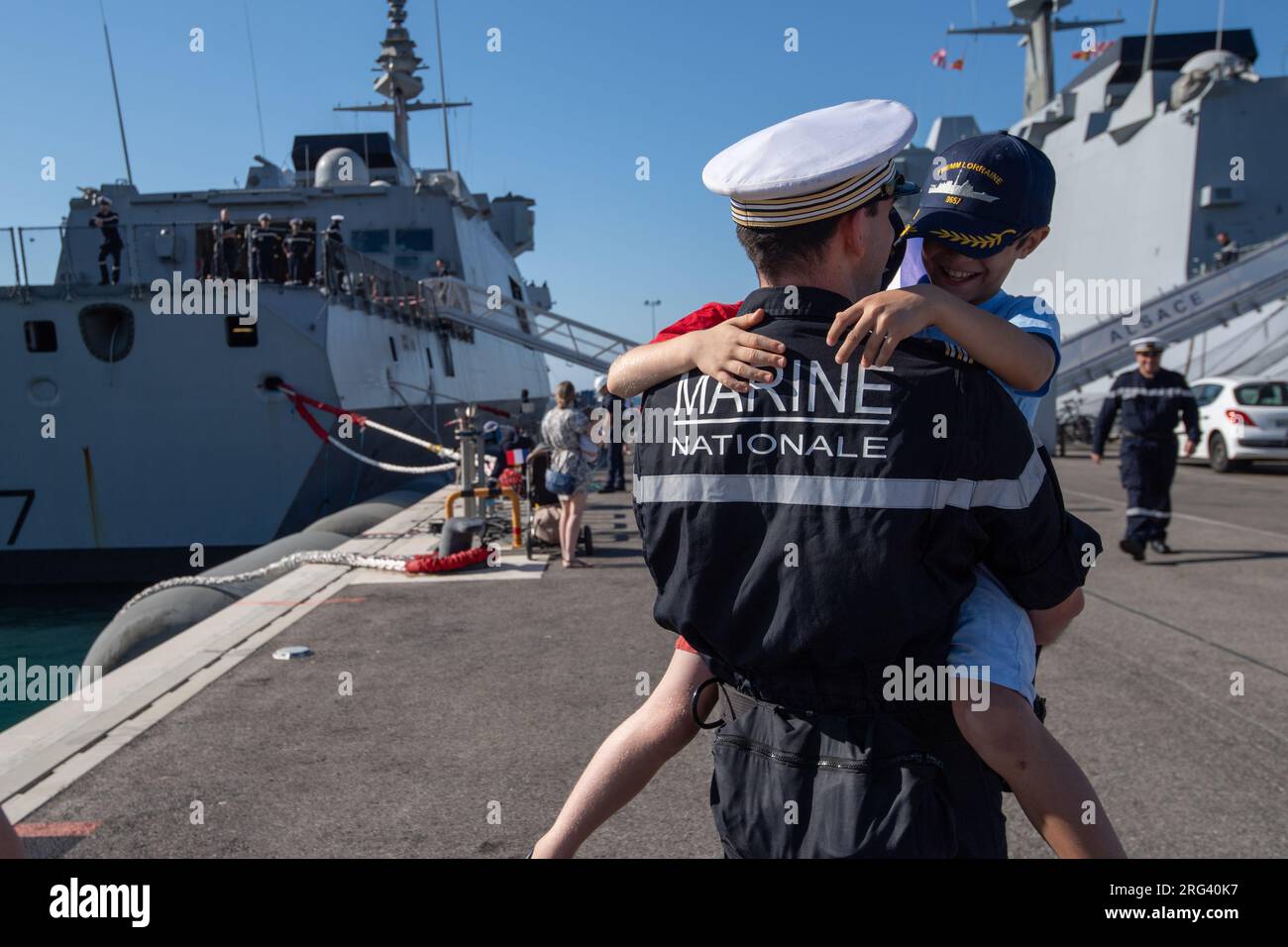 A sailor from the multi-mission frigate LORRAINE is reunited with his ...