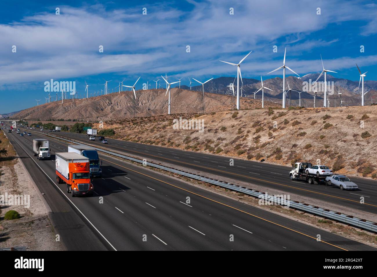 Traffic passes a wind farm in the San Gorgonio Pass near Palm Springs ...