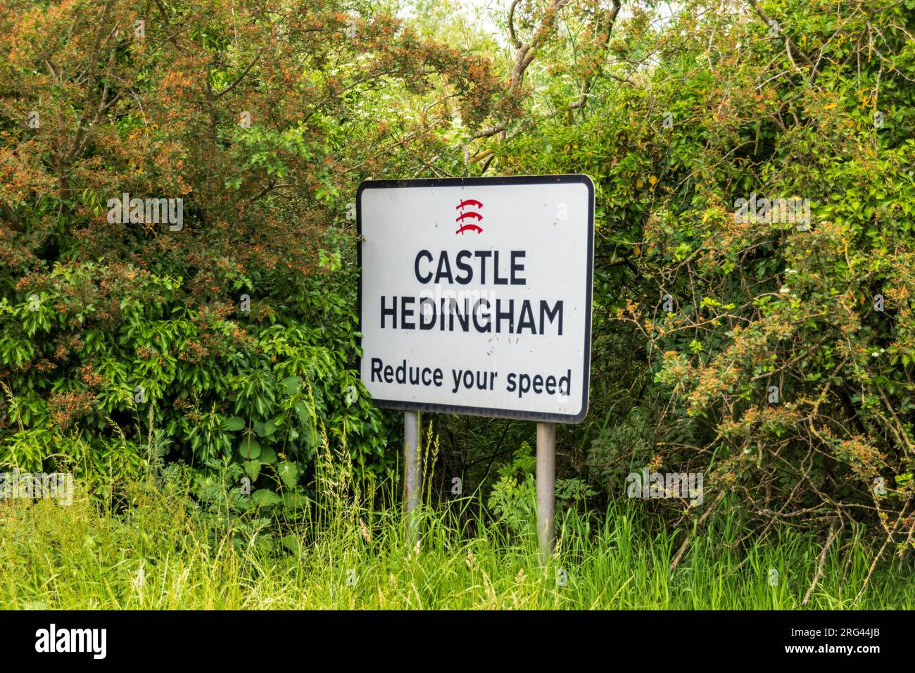 Reduce Your Speed Road Sign, Castle Hedingham Essex England UK Stock ...