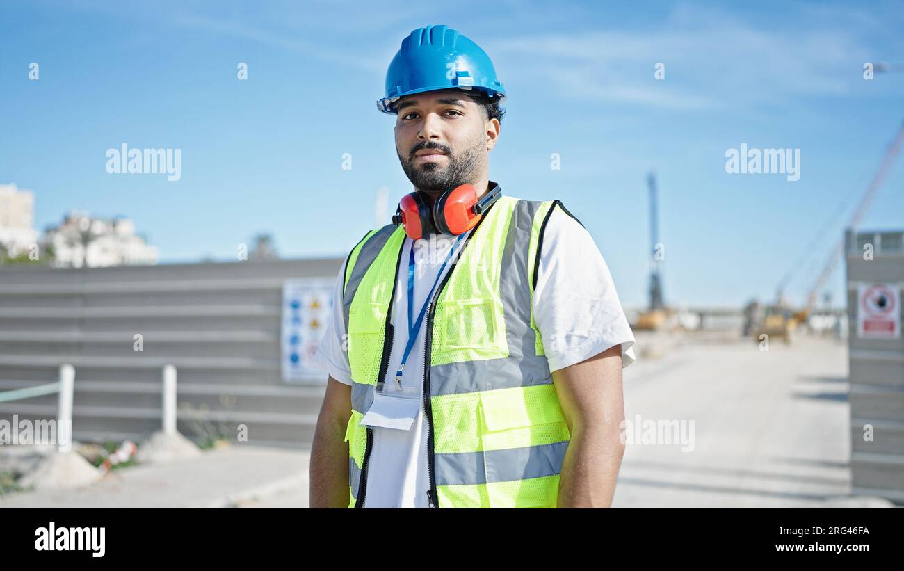 African american man builder standing with relaxed expression at street ...