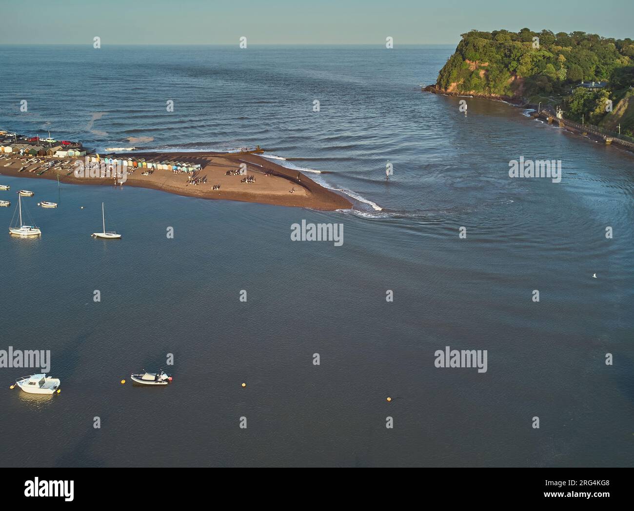 An aerial view of Teignmouth harbour and the mouth of the River Teign ...