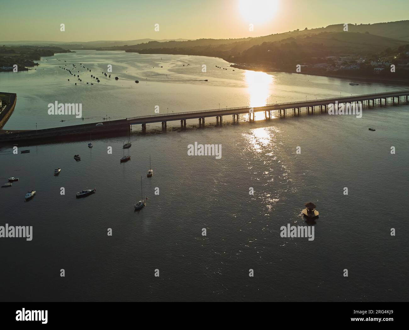 An evening view upriver along the estuary of the River Teign and over ...