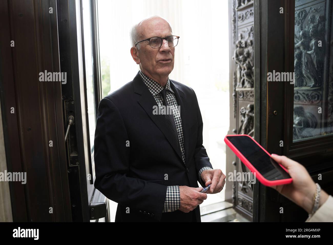 Sen. Peter Welch (D-Vt.) speaks with a reporter as he departs a vote at ...