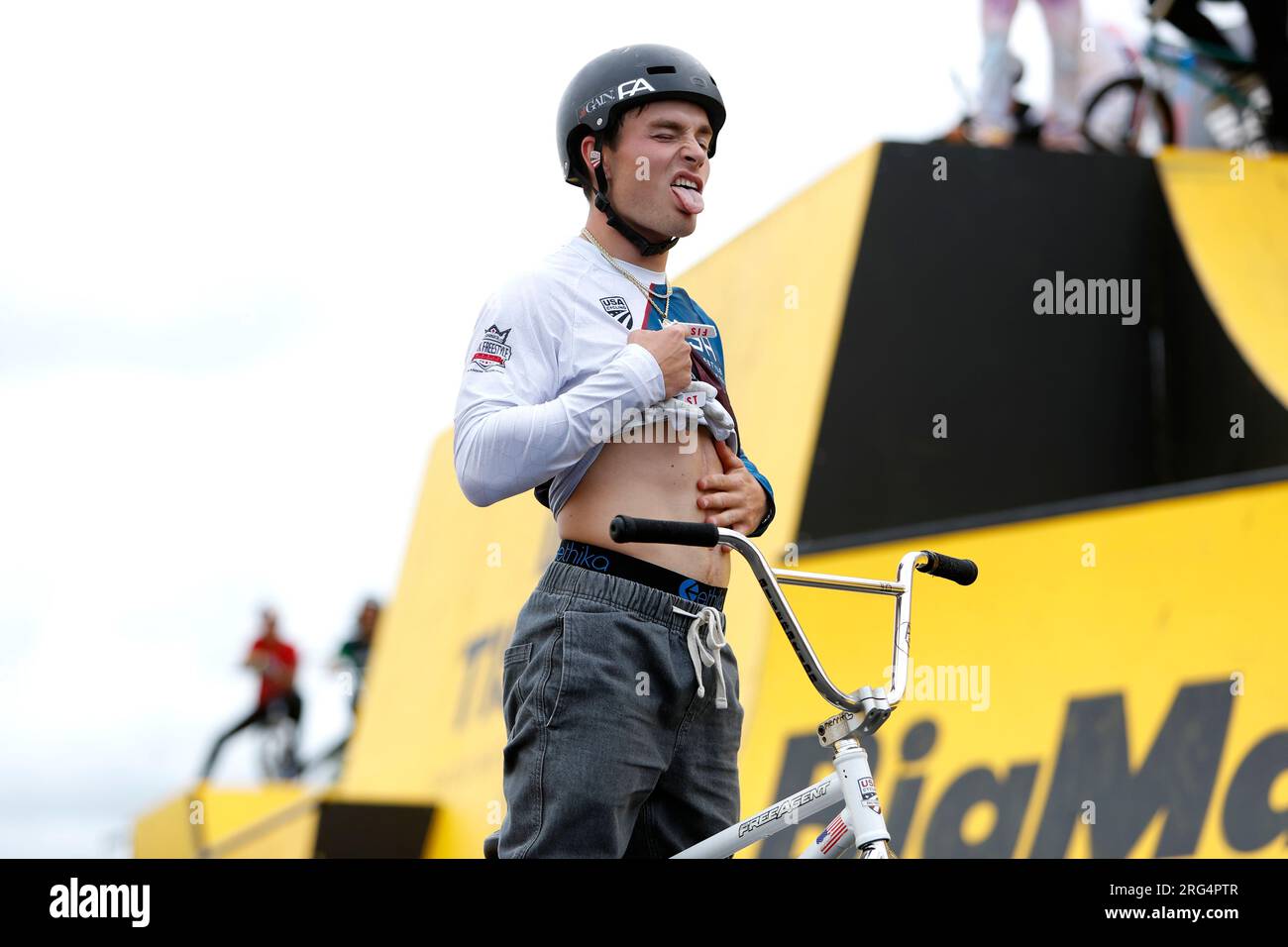 USA's Jacob Thiem shows the scar on his chest after competing in heat 2 ...