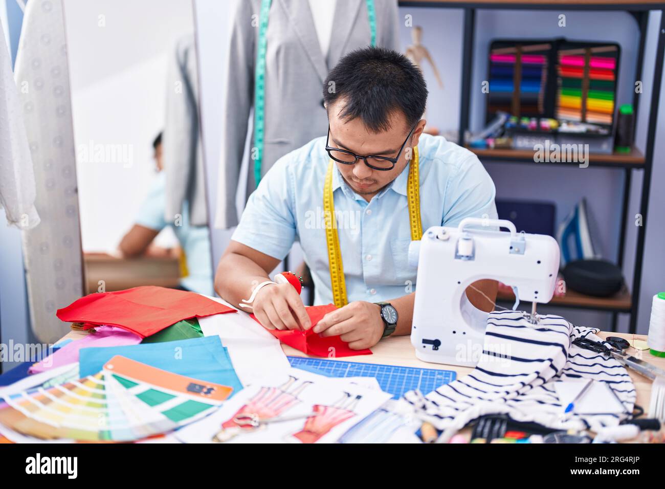 Handsome young tailor in hi-res stock photography and images - Alamy