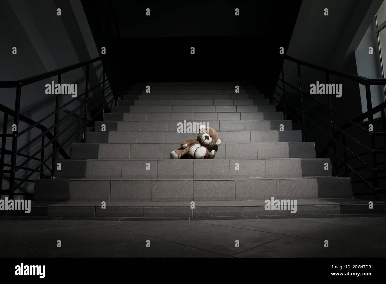 Teddy bear on stairs hi-res stock photography and images - Alamy