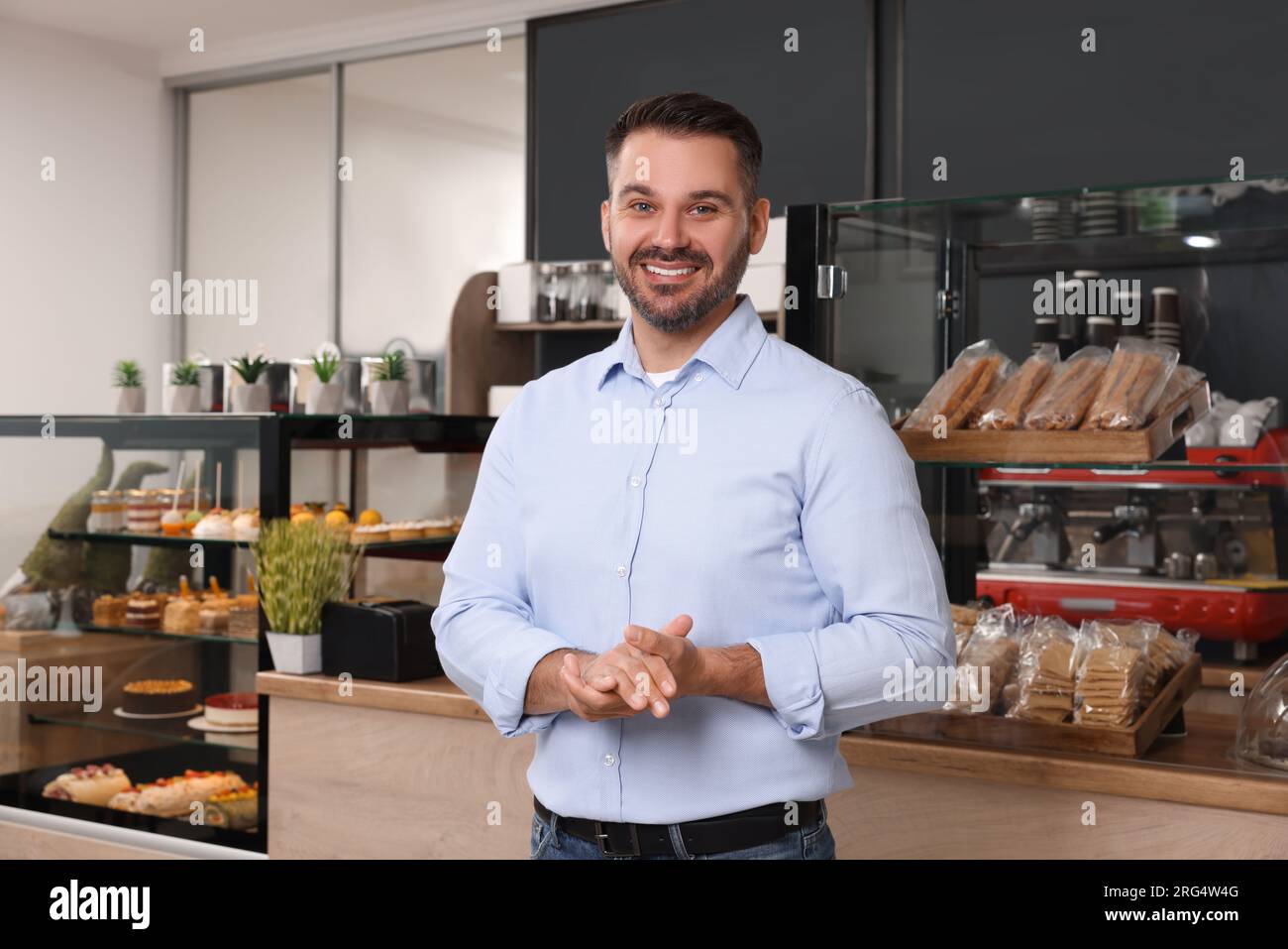 Owner start working cafe hi-res stock photography and images - Alamy