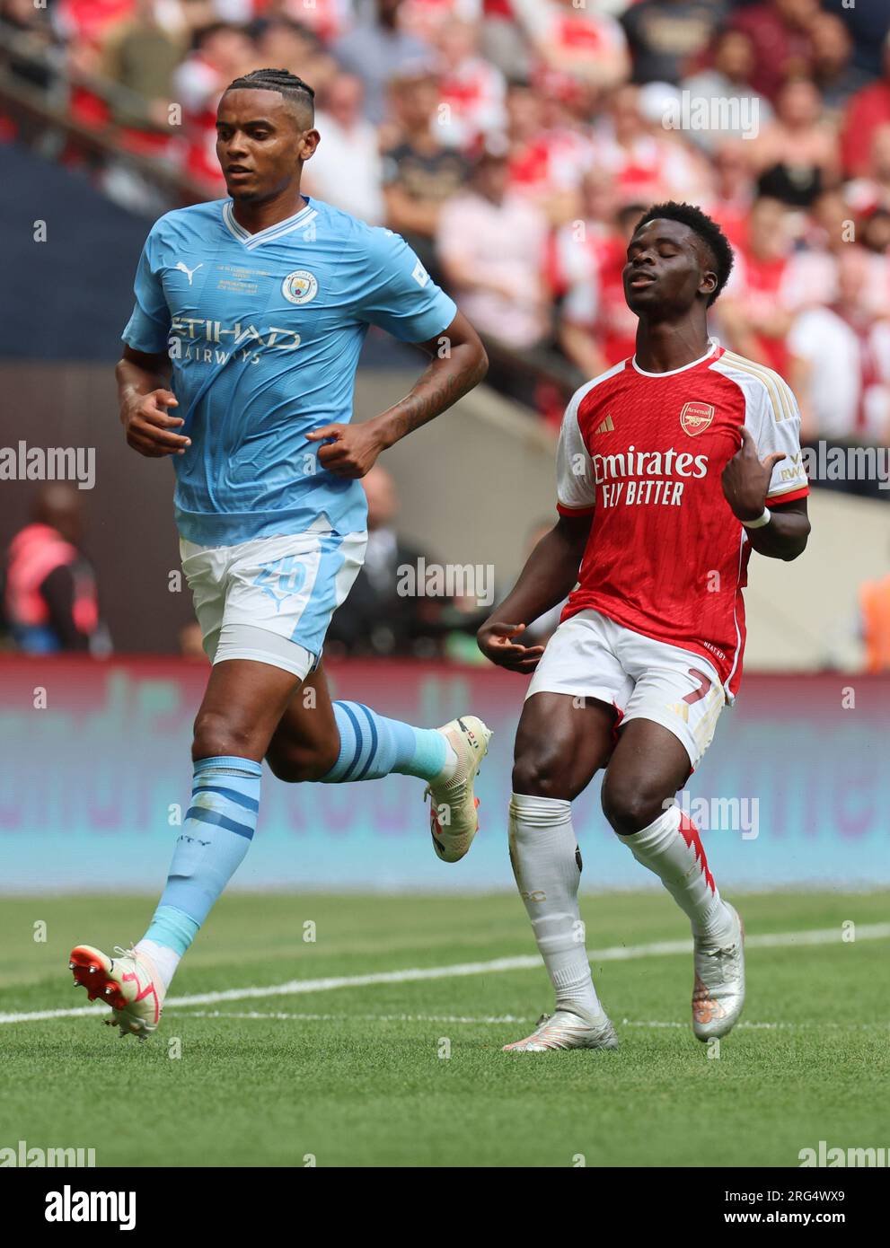L-R Manchester City's Manuel Akanji and Bukayo Saka of during THE FA ...