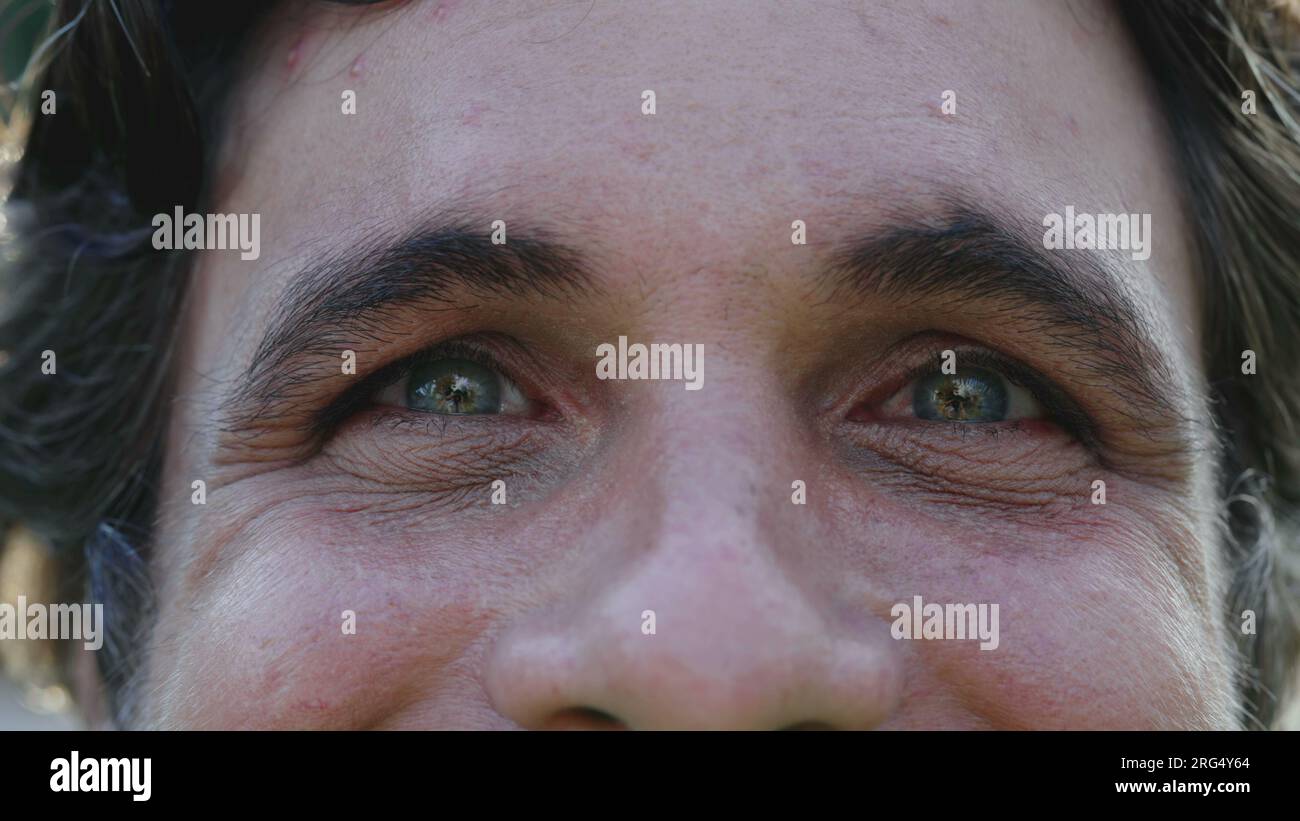 Male person close-up face looking at camera. 30s man with wrinkles and ...