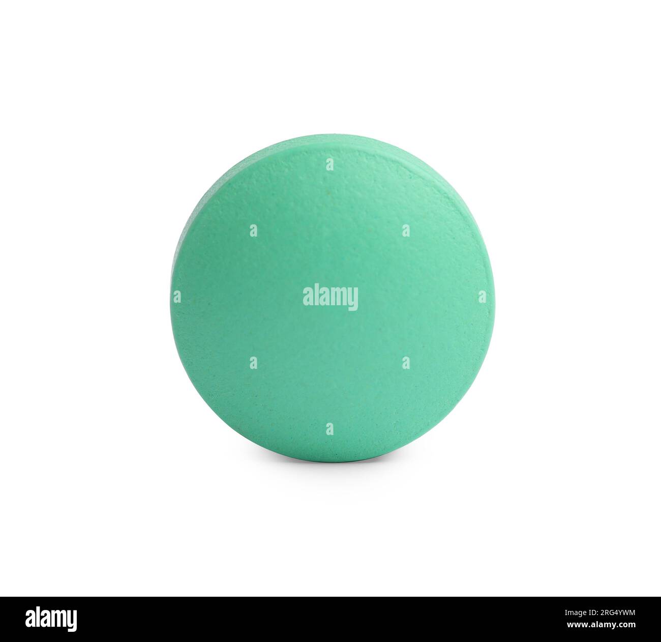One light green pill on white background. Medicinal treatment Stock ...