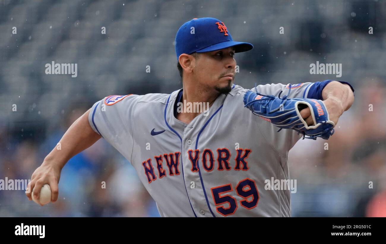New York Mets starting pitcher Carlos Carrasco throws during the first ...
