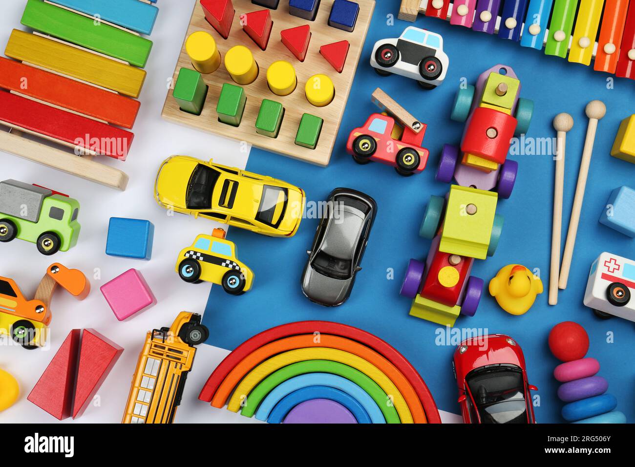 Different children's toys on color background, flat lay Stock Photo - Alamy