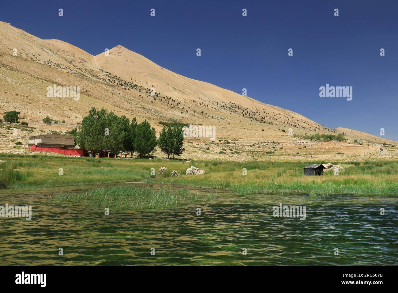 Scenic mountain peaks with a pond underneath in Lebanon Stock Photo - Alamy