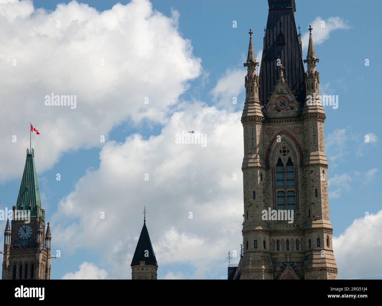Parliament Building, Peace Tower and West Block Tower and Small Plane ...
