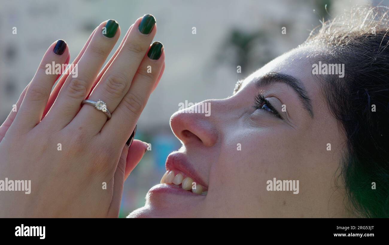Woman in prayer closing eyes in meditation and mindfulness ...