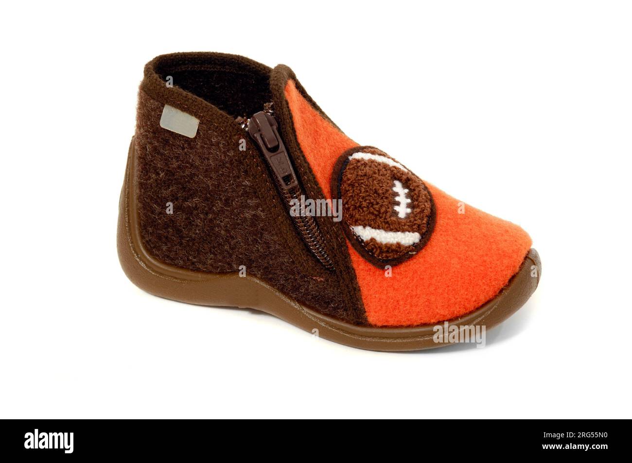 A sweet baby shoe taken on a clean white background Stock Photo - Alamy
