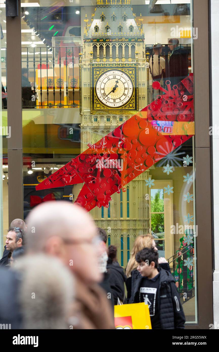 People walk past a model of the Elizabeth Tower, which houses Big Ben ...