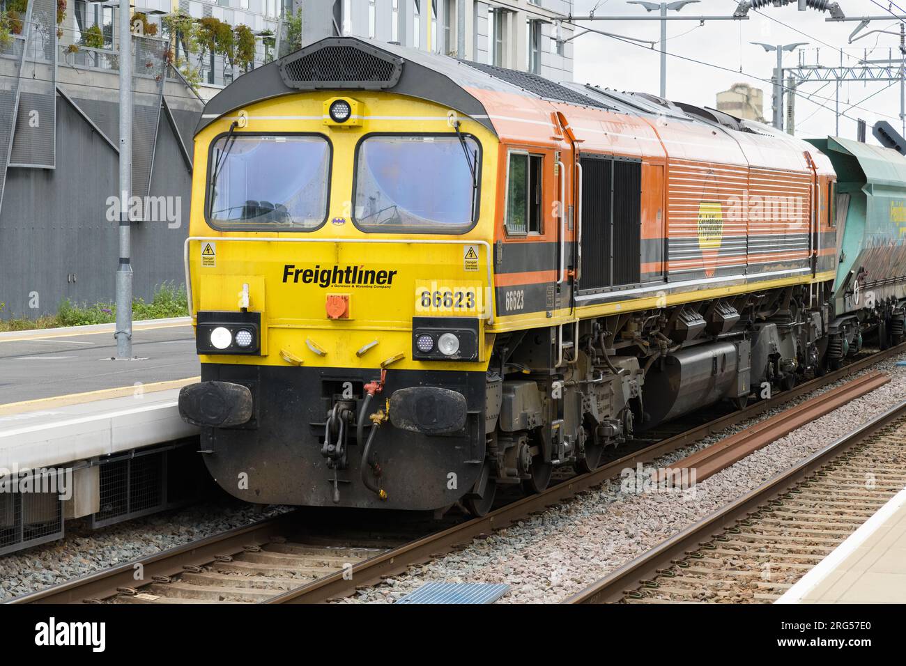 London, UK - July 28, 2023; Class 66 Freightliner hauled freight train ...