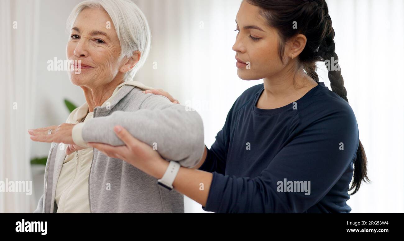 Physiotherapy, arm stretching and senior woman assessment, test or body ...