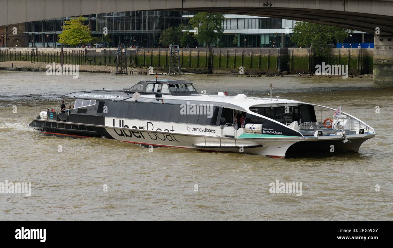 London, UK - July 29, 2023; Thames Clipper Uber Boat Tornado Clipper on ...