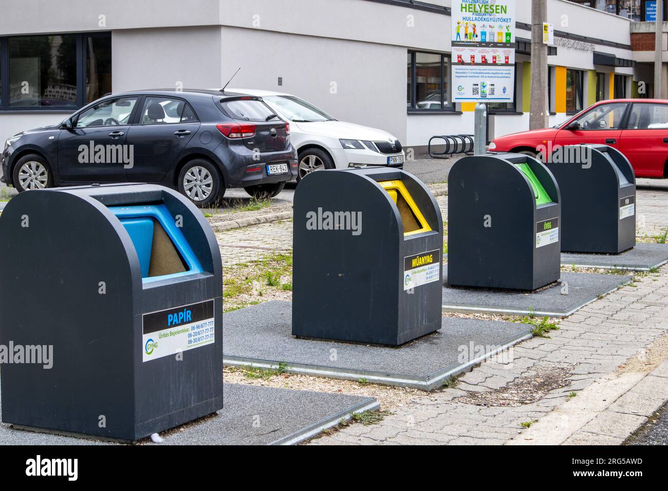 Separate waste bins on the street Stock Photo - Alamy