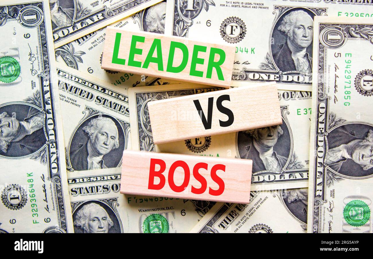 Boss vs leader symbol. Concept words Boss vs versus leader on wooden ...