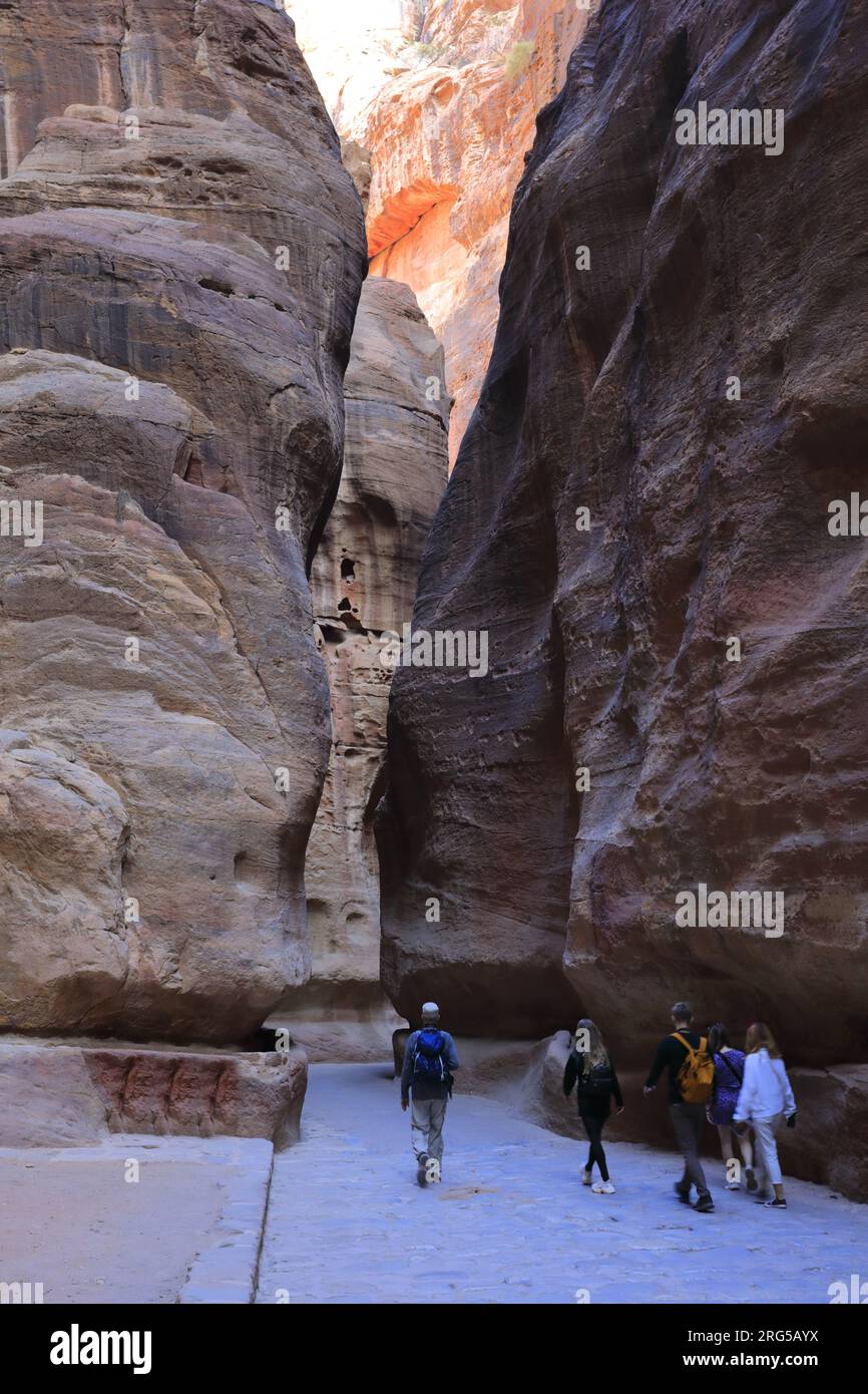People walking along the Al-Siq, the Main Entrance Canyon to Petra ...