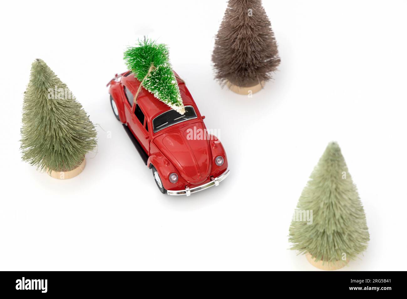 Vintage red car decor with Christmas Tree. Transporting Christmas tree ...
