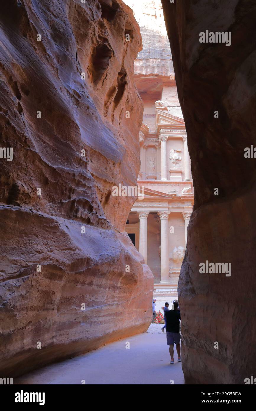 People walking along the Al-Siq, the Main Entrance Canyon to Petra ...