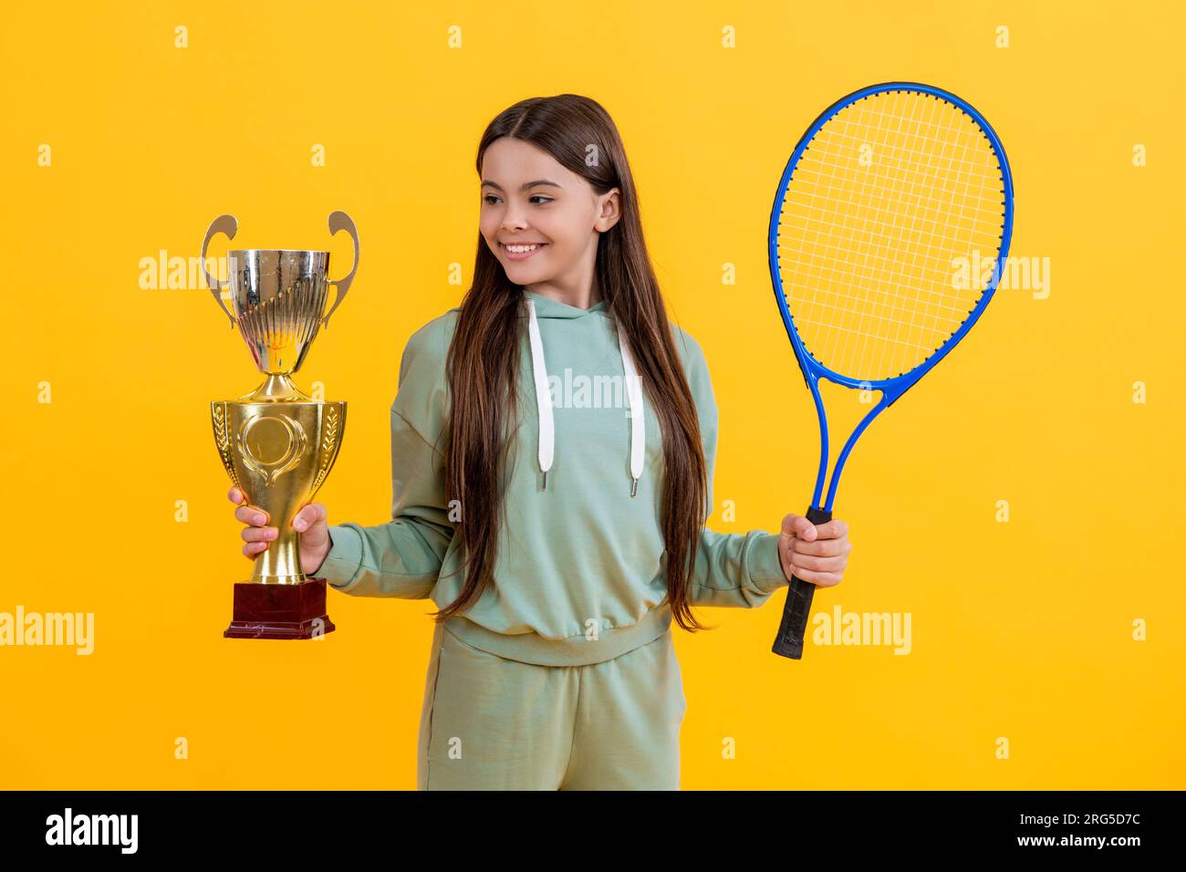 teen girl player celebrating win as tennis or badminton champion. skilled tennis champion Stock ...