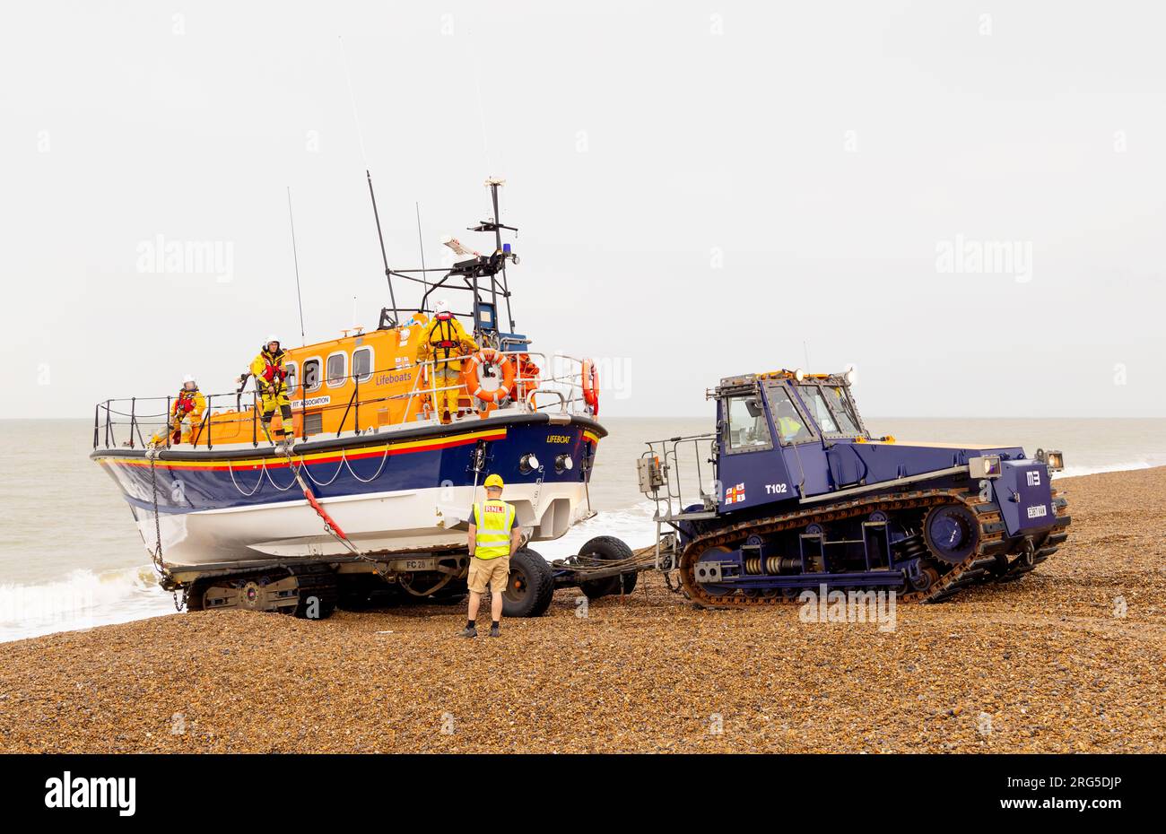 The Aldeburgh RNLI crew preparing the lifeboat for launching into the ...