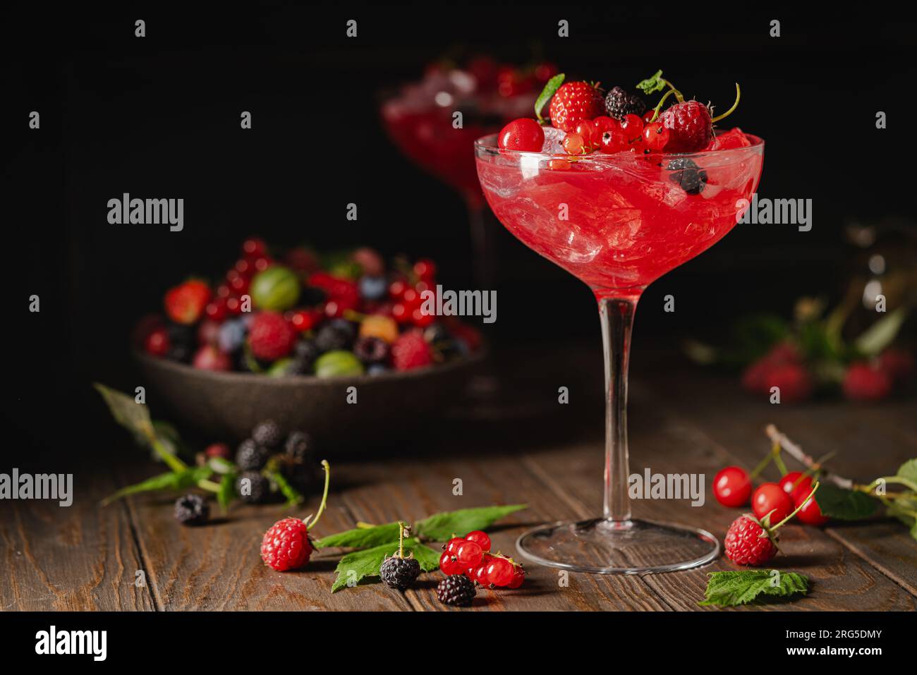 Glass of berry cocktail Stock Photo - Alamy