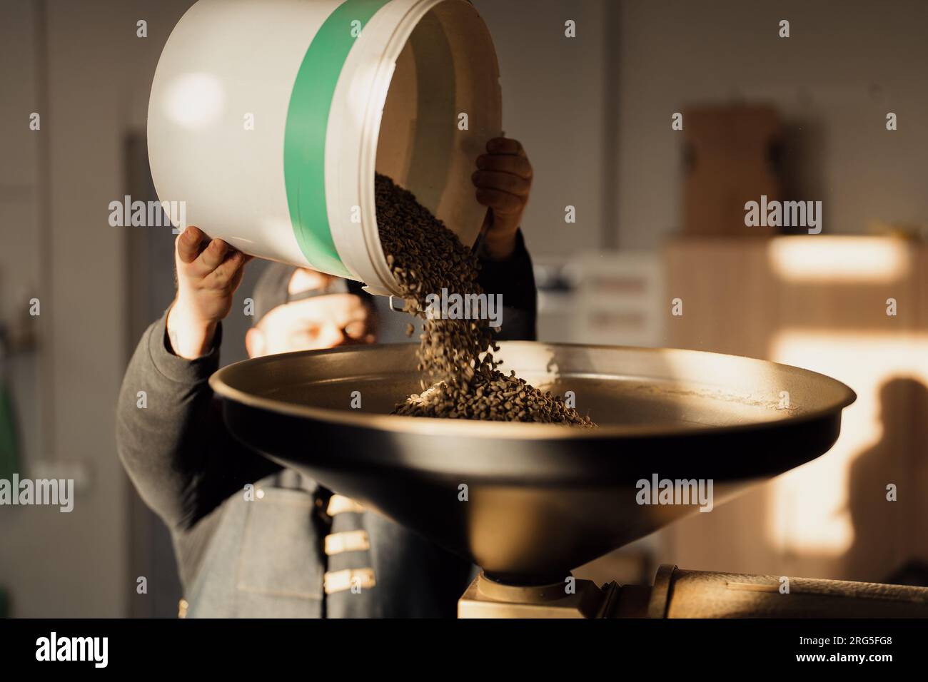 Coffee beans pouring hopper hi-res stock photography and images - Alamy