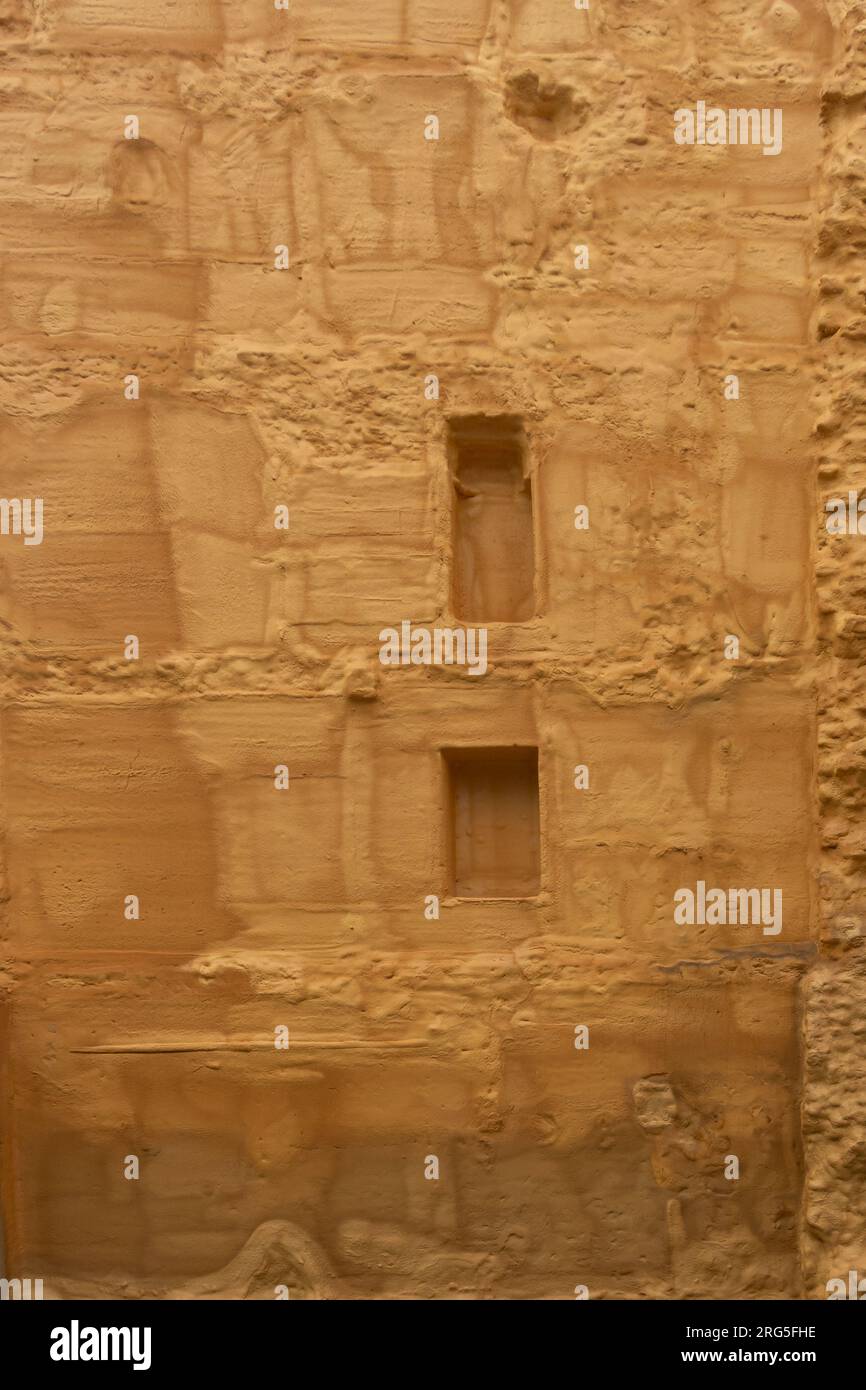 Yellow render sprayed on wall of existing building adjoining the site ...