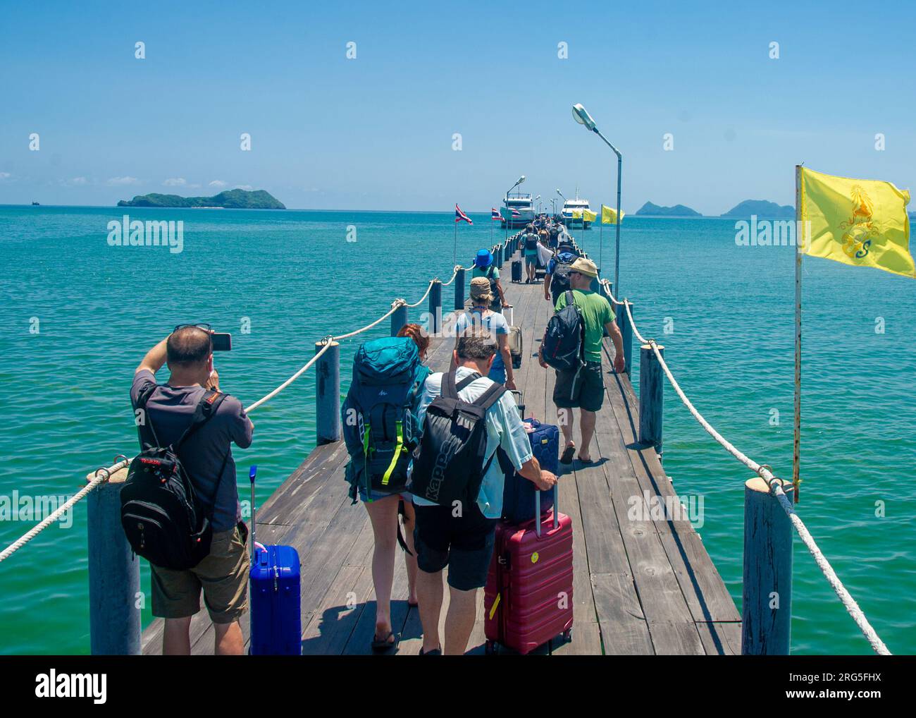 March 03 2023 Chumphon Thailand Harbor- Hurried tourists are taking the ...
