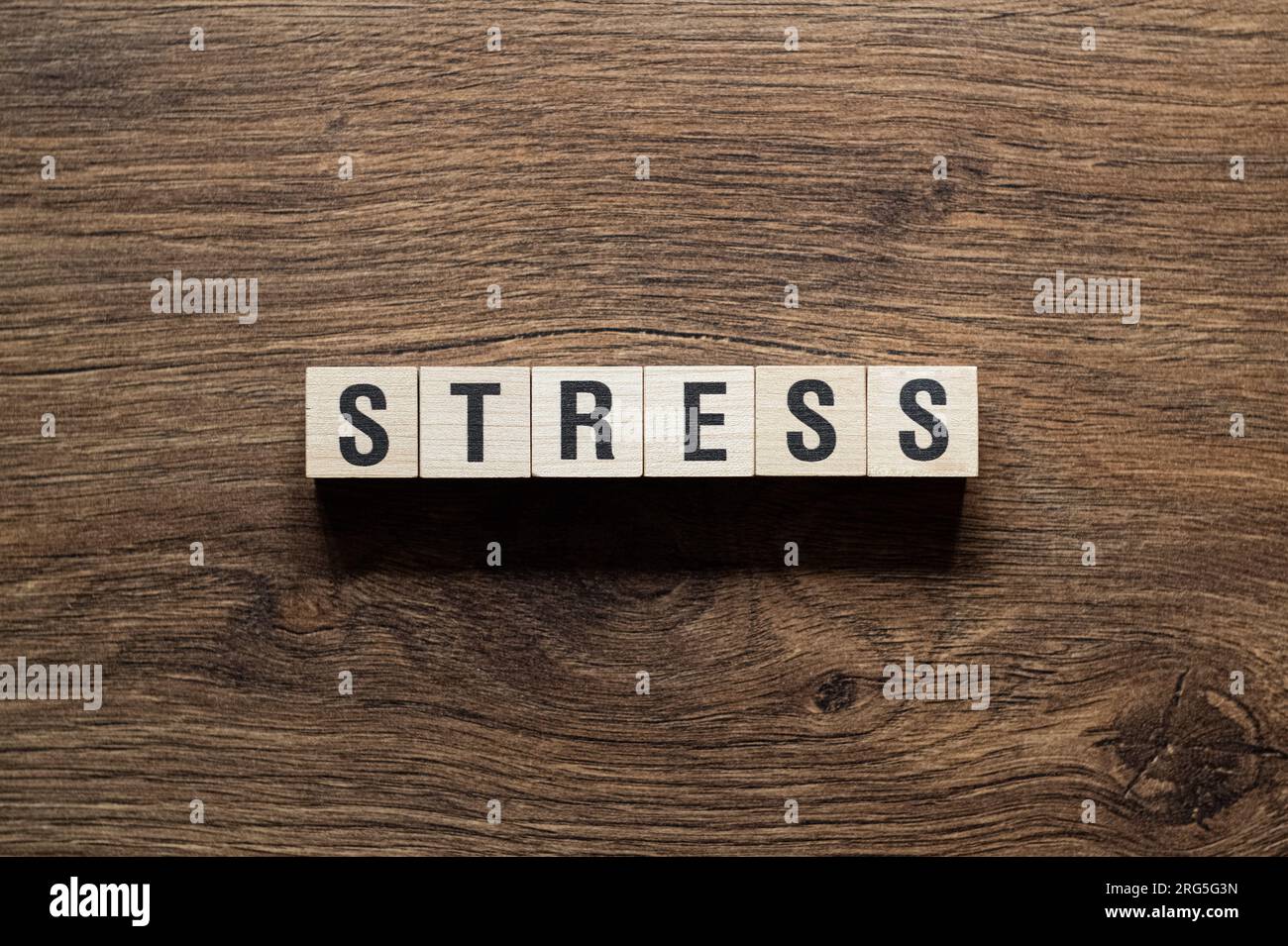 Stress - word concept on building blocks, text Stock Photo - Alamy