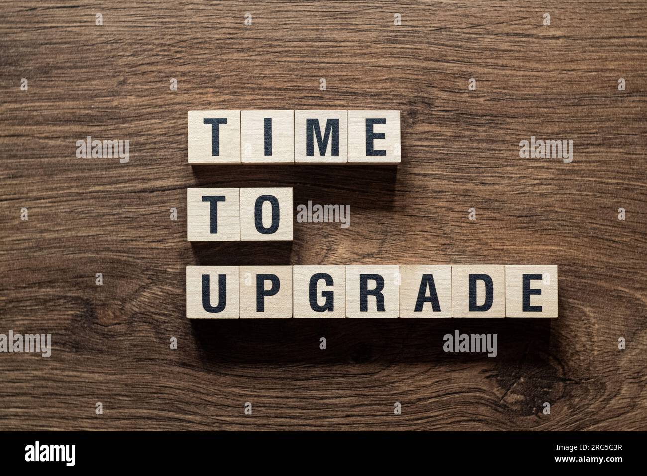 Time to upgrade - word concept on building blocks, text Stock Photo - Alamy