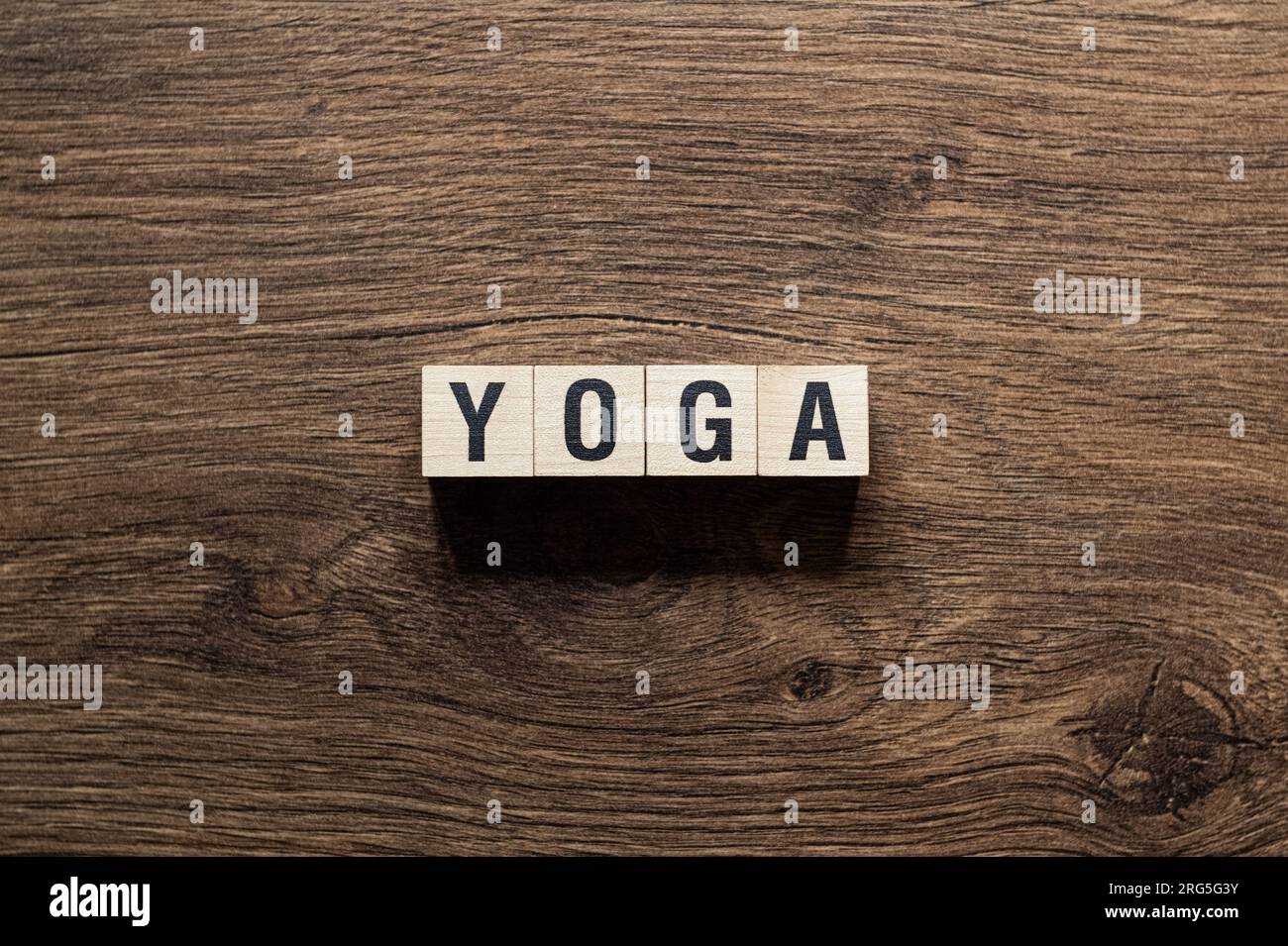 Yoga - word concept on building blocks, text Stock Photo - Alamy