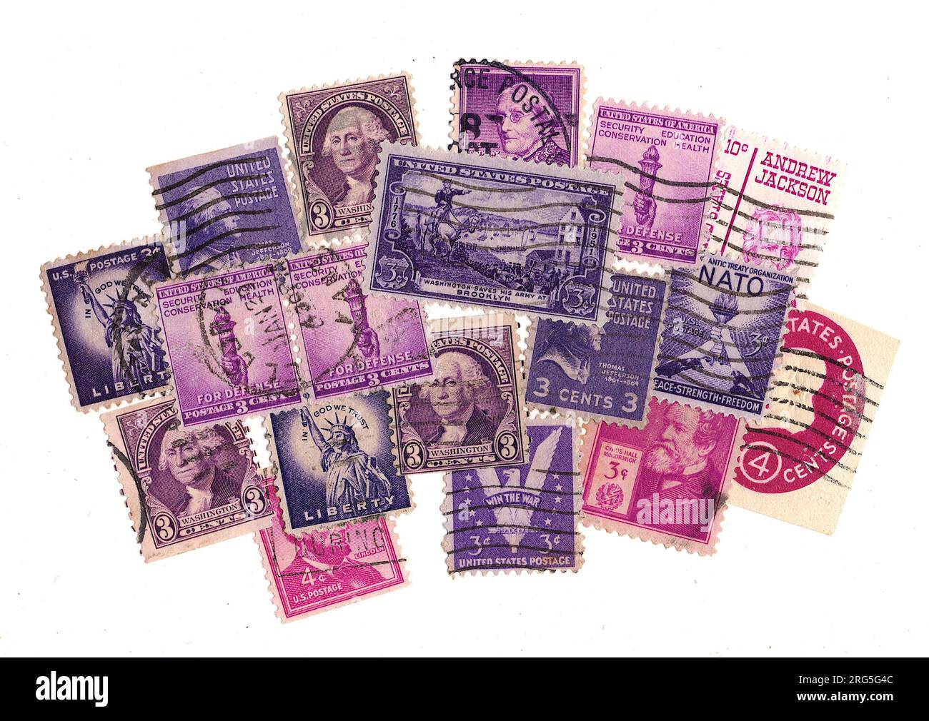 A montage of purple vintage postage stamps from the USA on a white ...