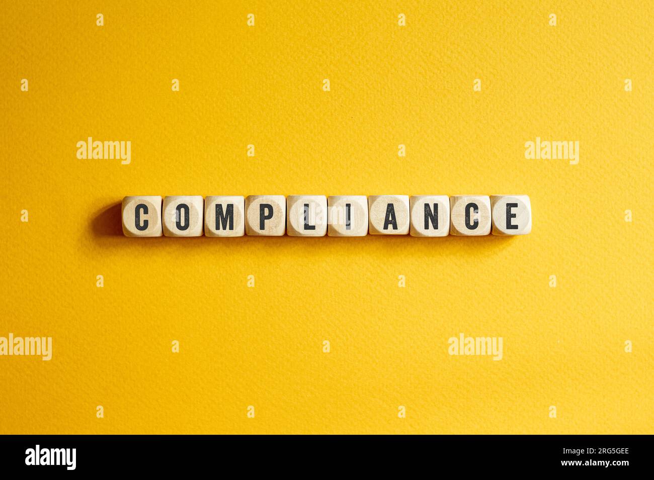 Compliance - word concept on building blocks, text Stock Photo - Alamy