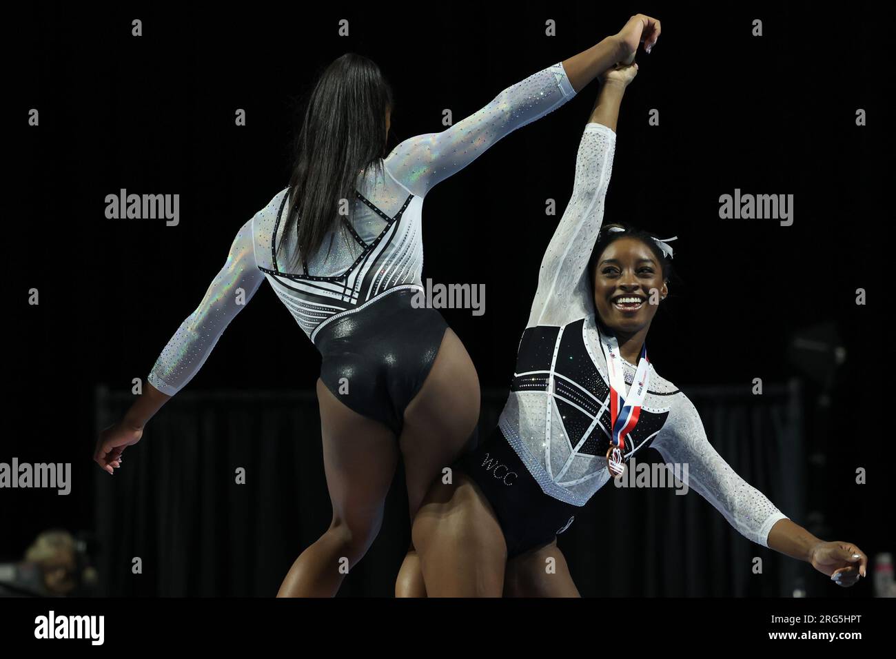 August 5, 2023: Uneven bars gold medalist Zoe Miller celebrates with ...