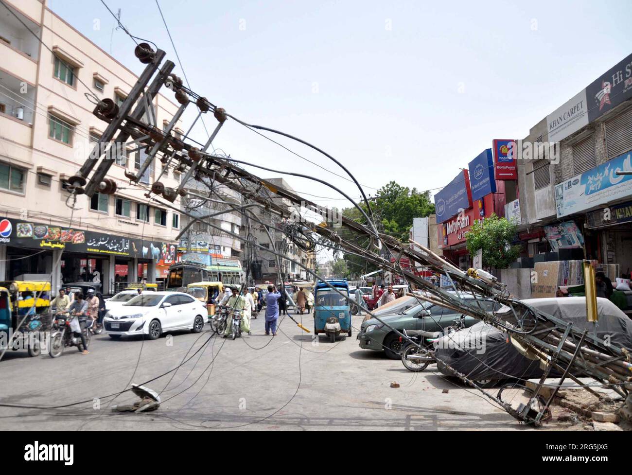 Nawabshah,, August 7, 2023. Electric pole seen falling inviting ...