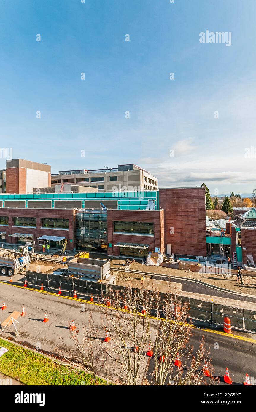 Construction workers and equipment at a building project construction ...