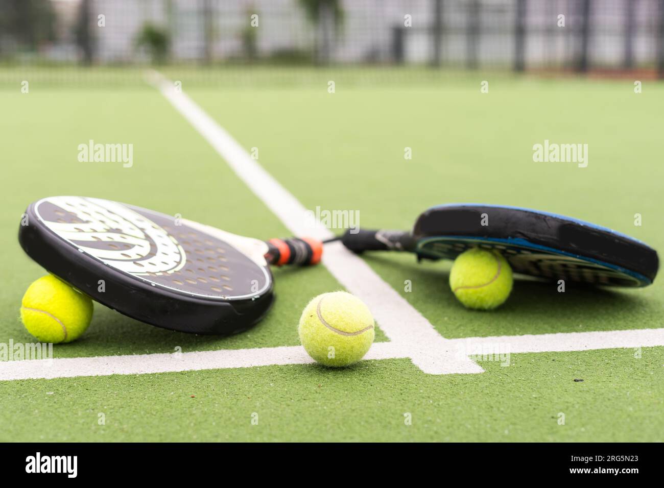 happy pretty girl practicing paddle sport on the paddle court Stock ...