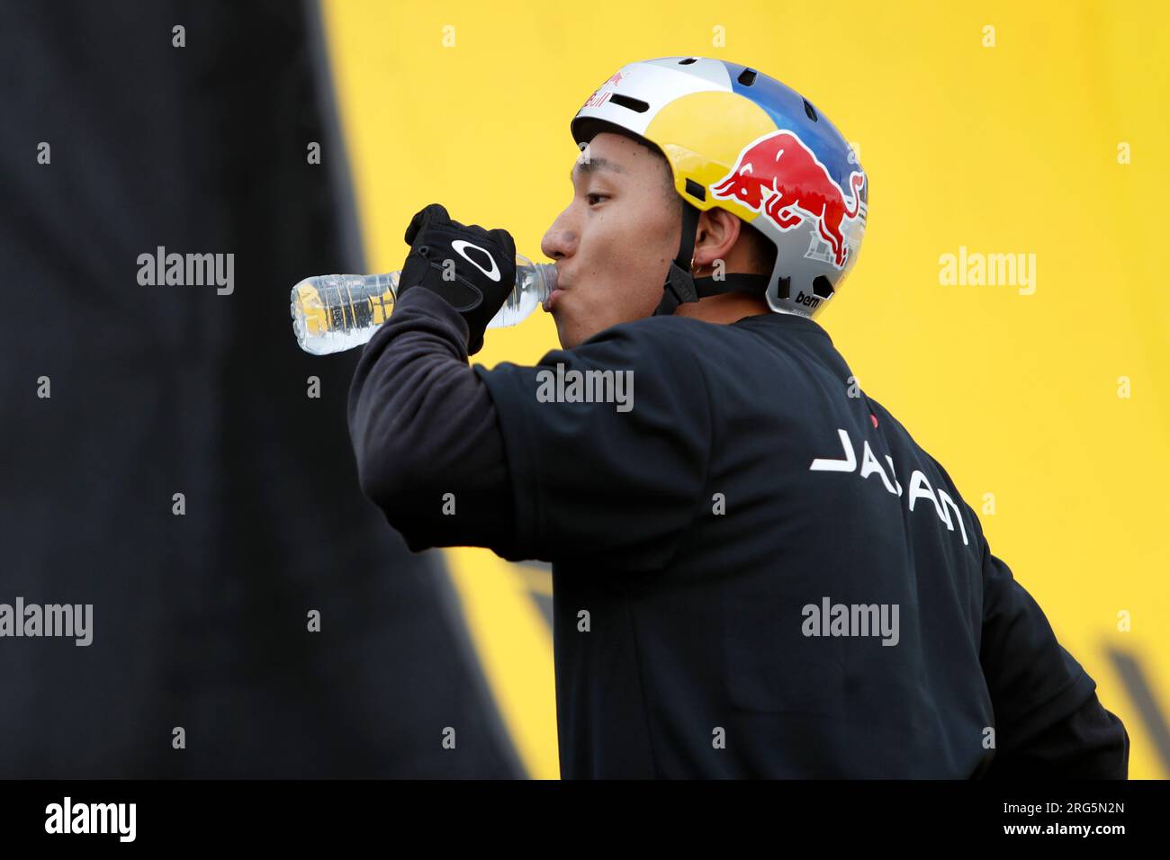 Japan's Rimu Nakamura takes a drink after competing in Heat 2 of the ...