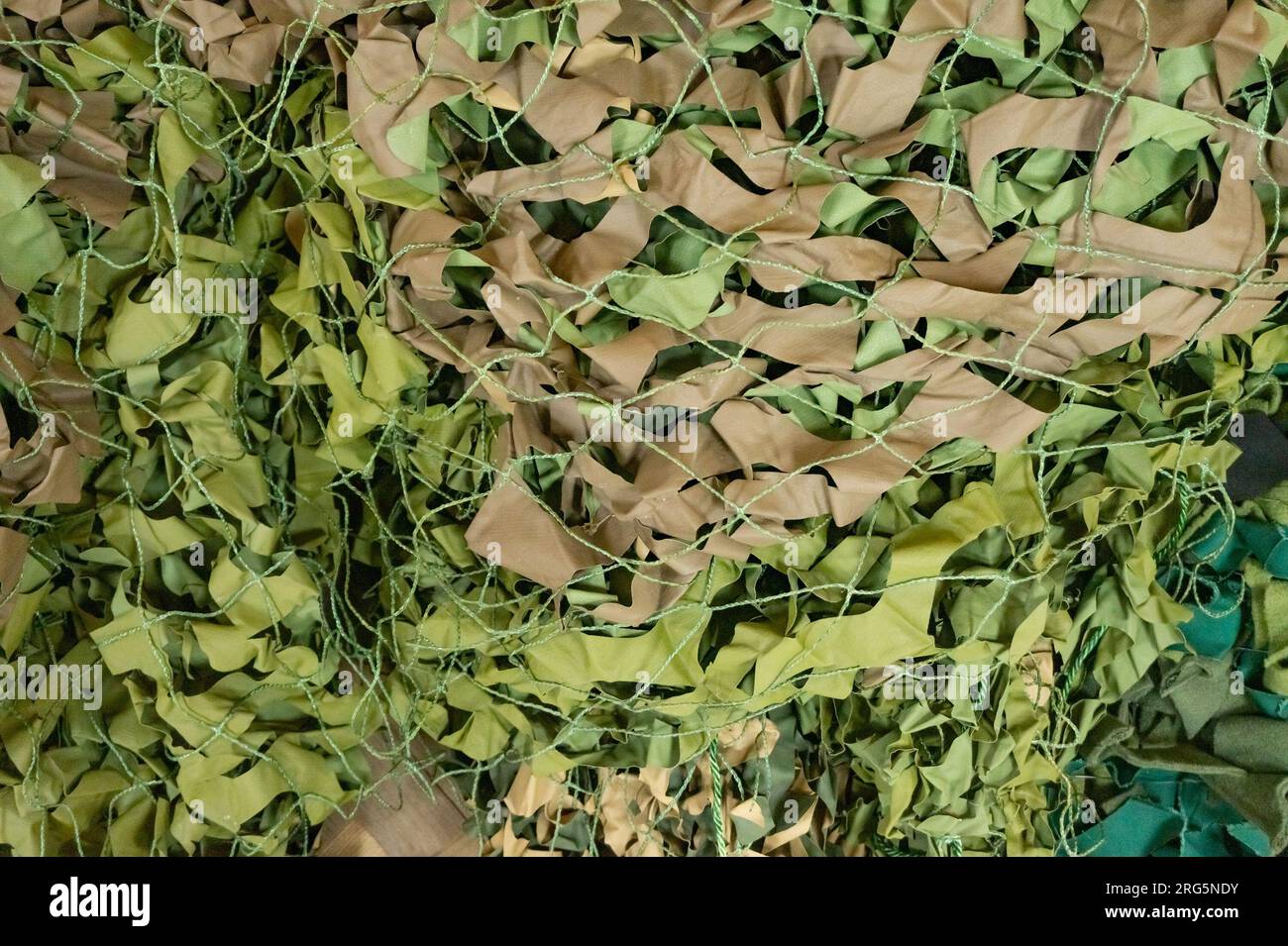 Homemade camouflage nets made from scraps of fabric to help the ...