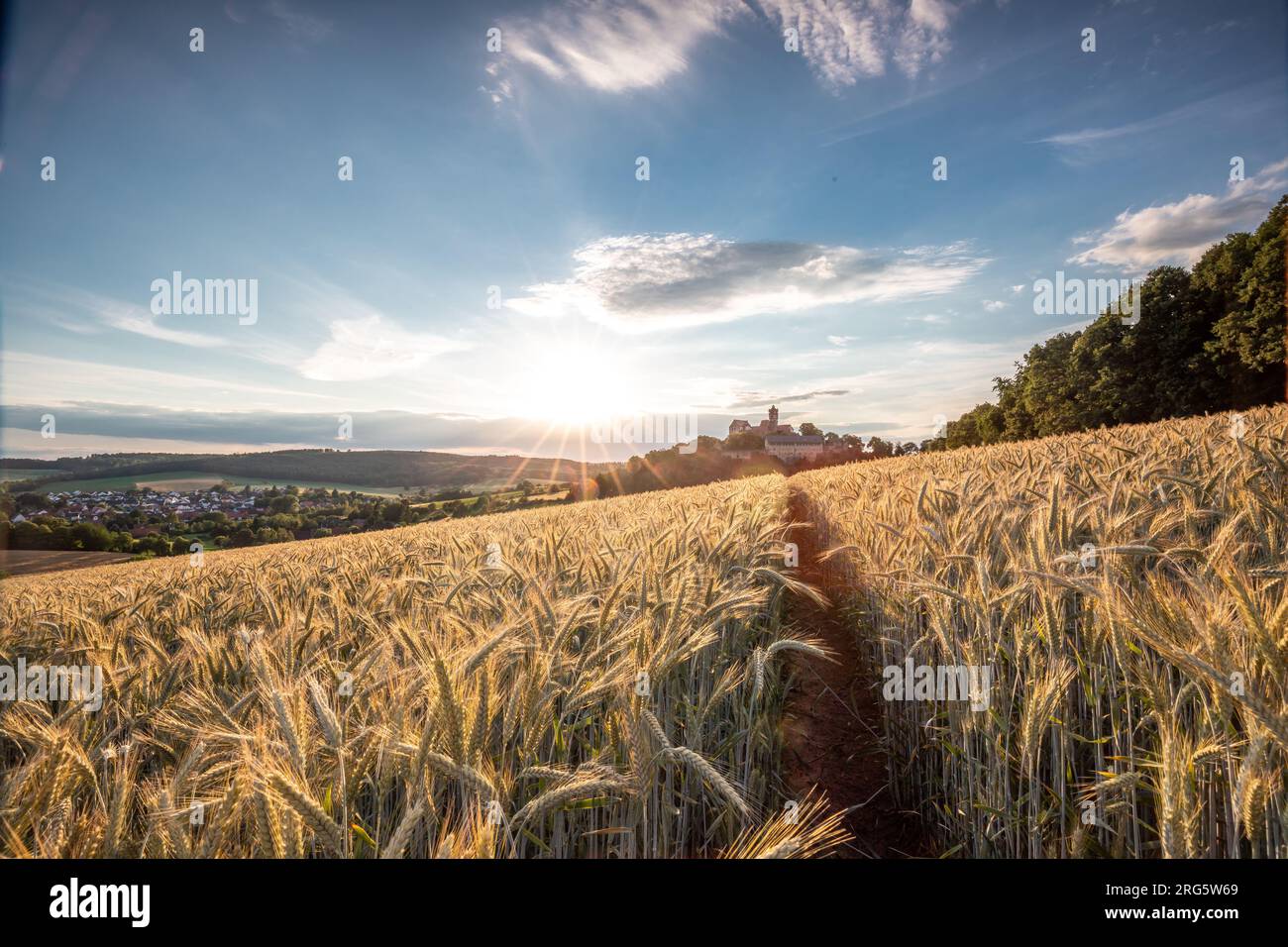 The Ronneburg in Germany in a great landscape photo. Beautiful fields ...