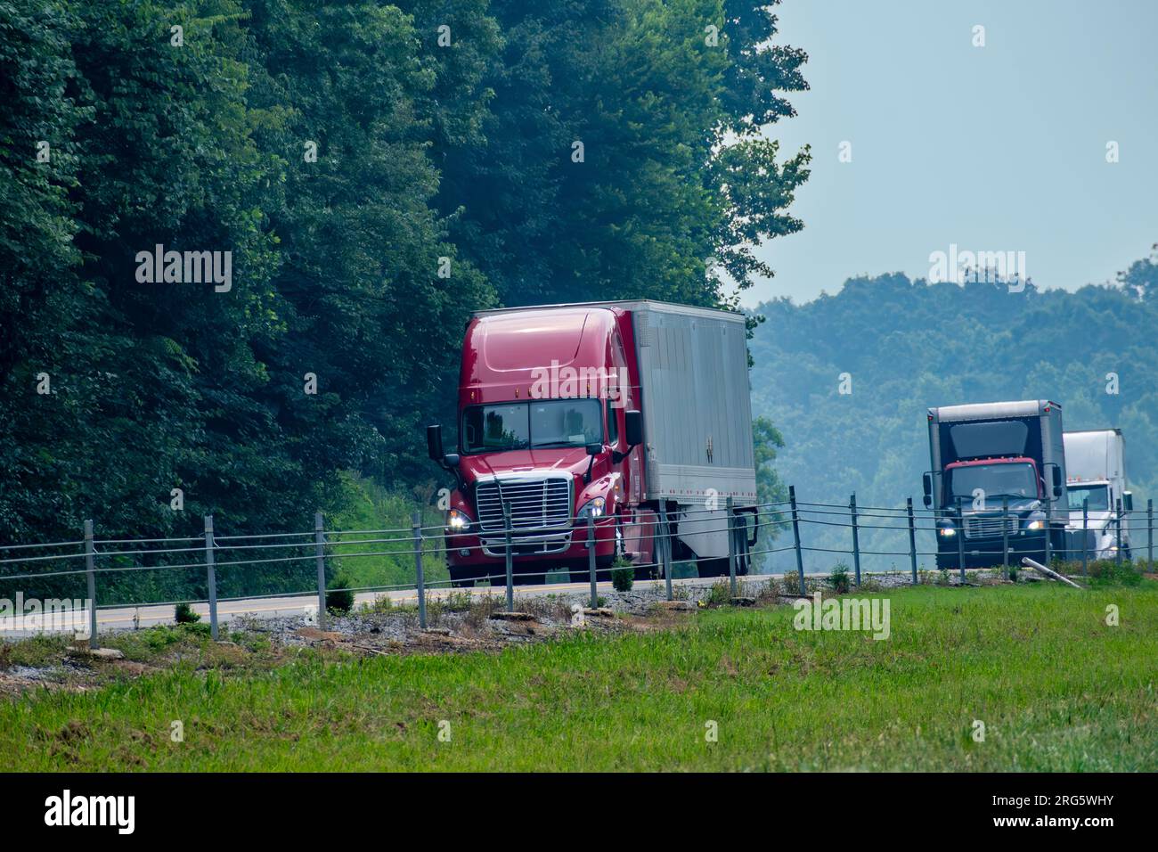 Horizontal shot of trucks on a Tennessee interstate Stock Photo - Alamy