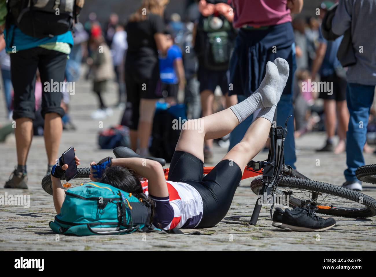 Pilgrims on the Camino de Santiago arrive at the Plaza del Obradoiro ...